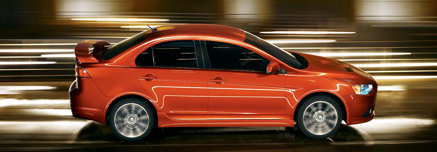 Orange Mitsubishi Lancer Evo